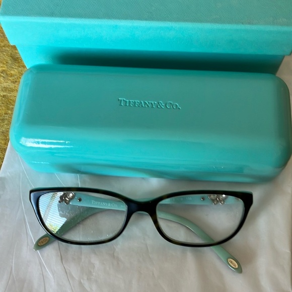 Black Glasses With Teal Accents